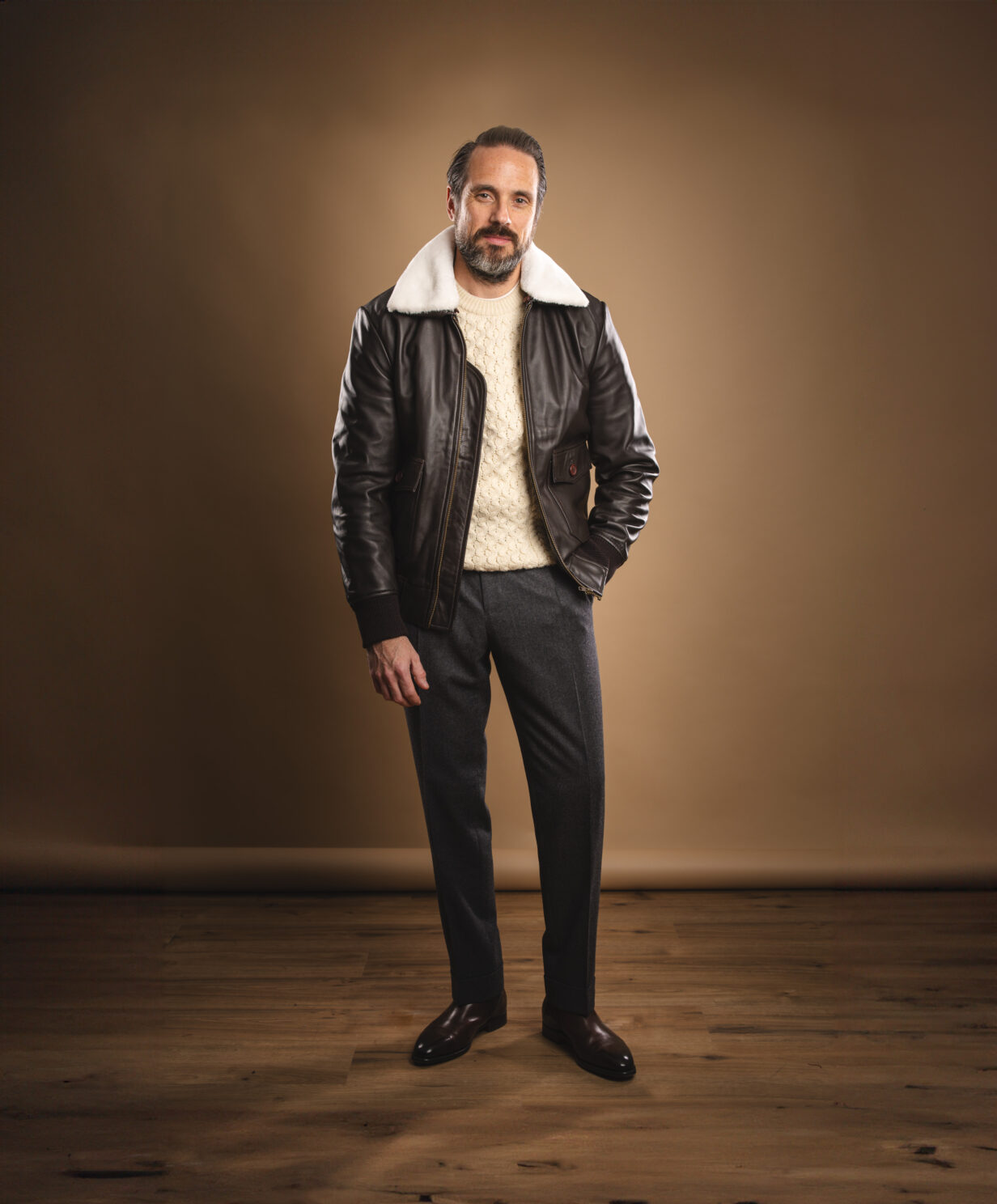 Brown Leather Bomber Jacket With Sweater And Flannel Pants | He Spoke Style