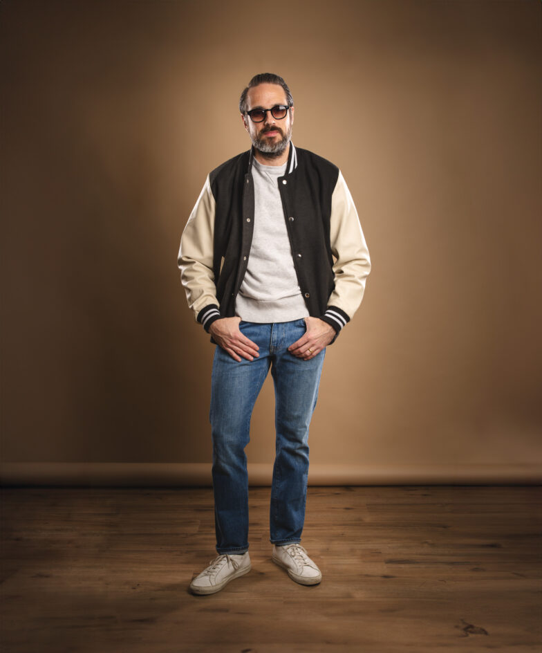 Varsity Jacket With Sweatshirt, Jeans & Sneakers | He Spoke Style