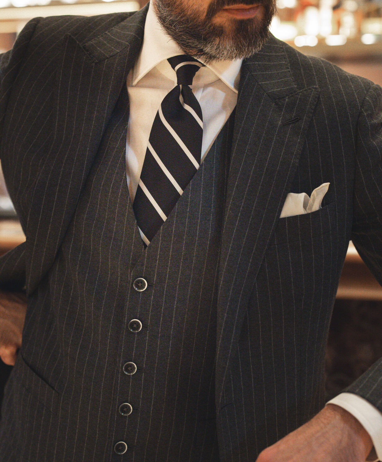 Gray Three-Piece Pinstripe Suit Outfit Idea | He Spoke Style