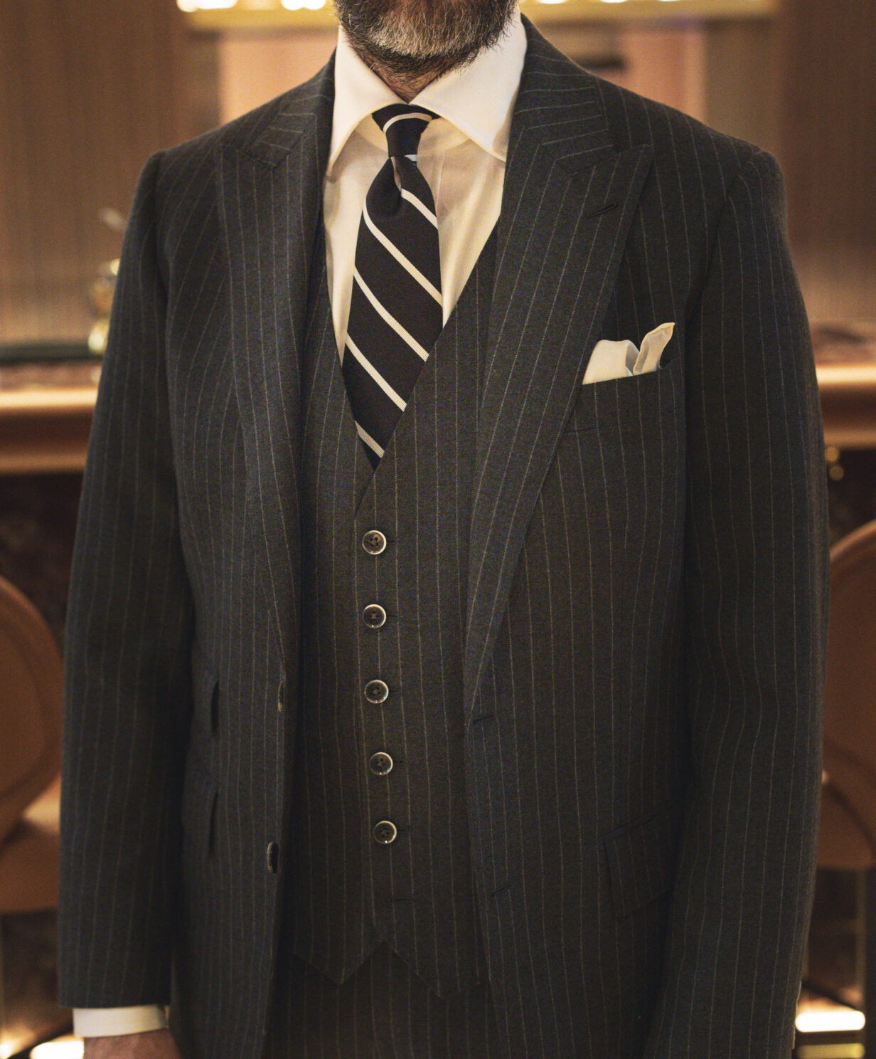 Gray Three-Piece Pinstripe Suit Outfit Idea | He Spoke Style