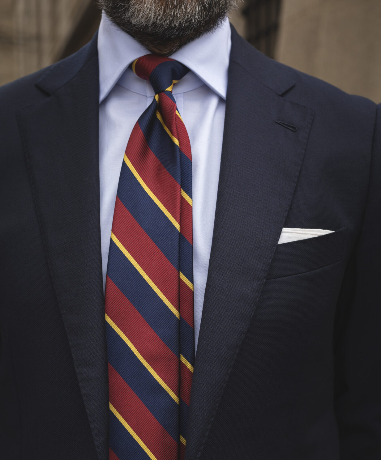 Classic Menswear Uniform With Regimental Tie And Loafers | He Spoke Style